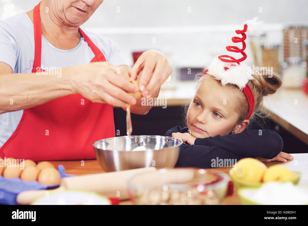 Grandmother making something yummy Stock Photo - Alamy