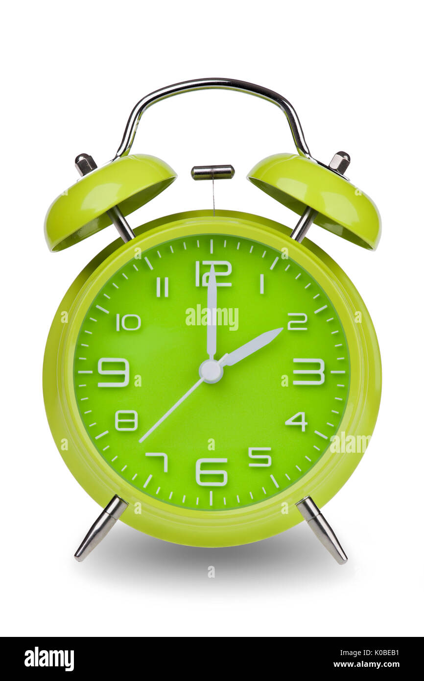 Green alarm clock with the hands at 2 am or pm isolated on a white ...