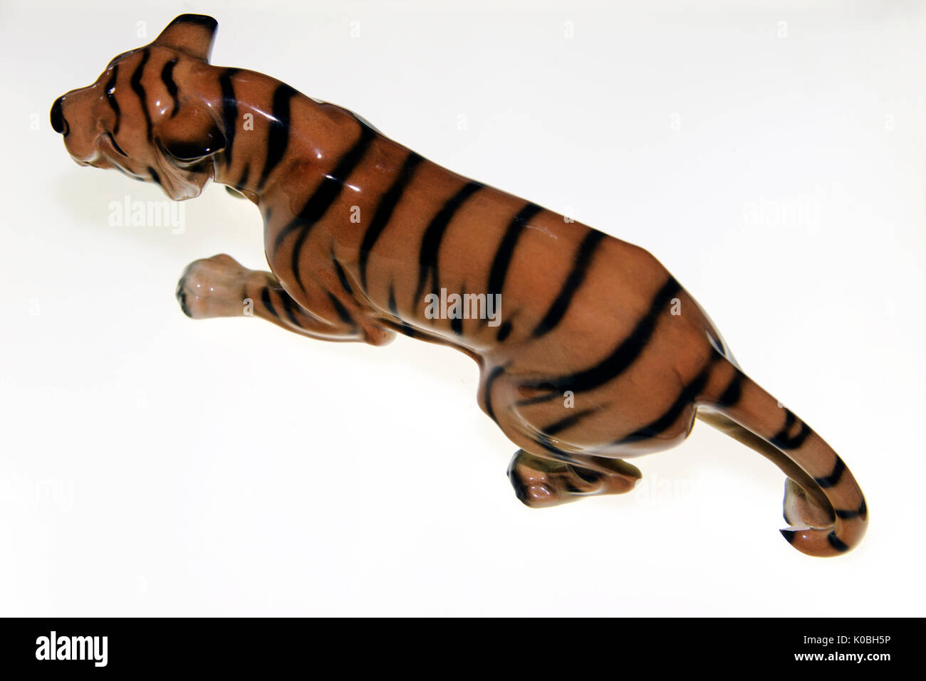 Porcelain tiger figurine Stock Photo - Alamy