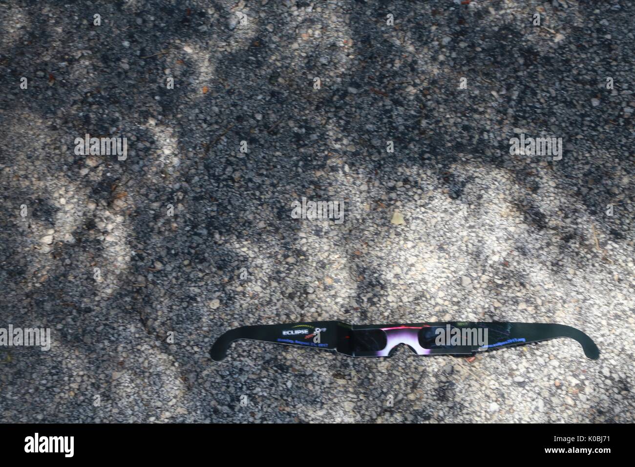 Solar eclipse crescent shadows hi-res stock photography and images - Alamy