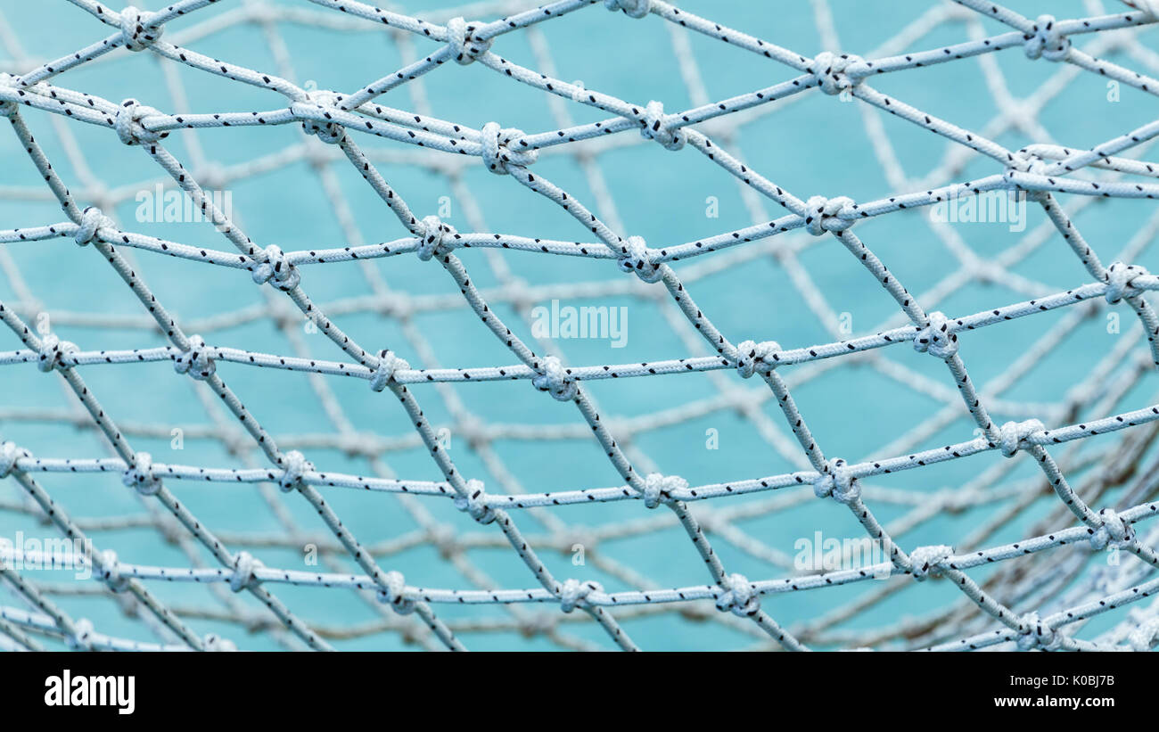 Yacht safety nets of sailing yacht and ocean background Stock Photo - Alamy