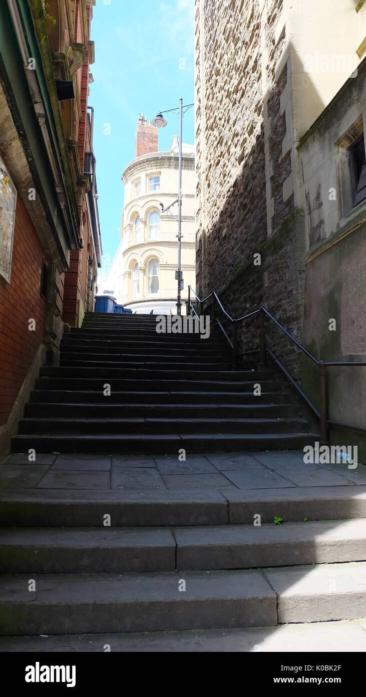 A deserted, considerably wide staircase alley in between two buildings ...