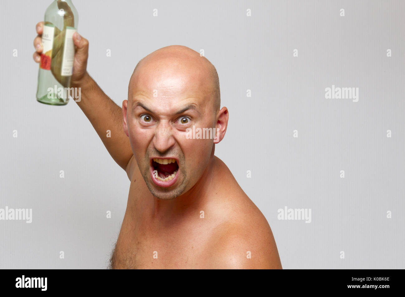 Aggressive drunk man Stock Photo - Alamy