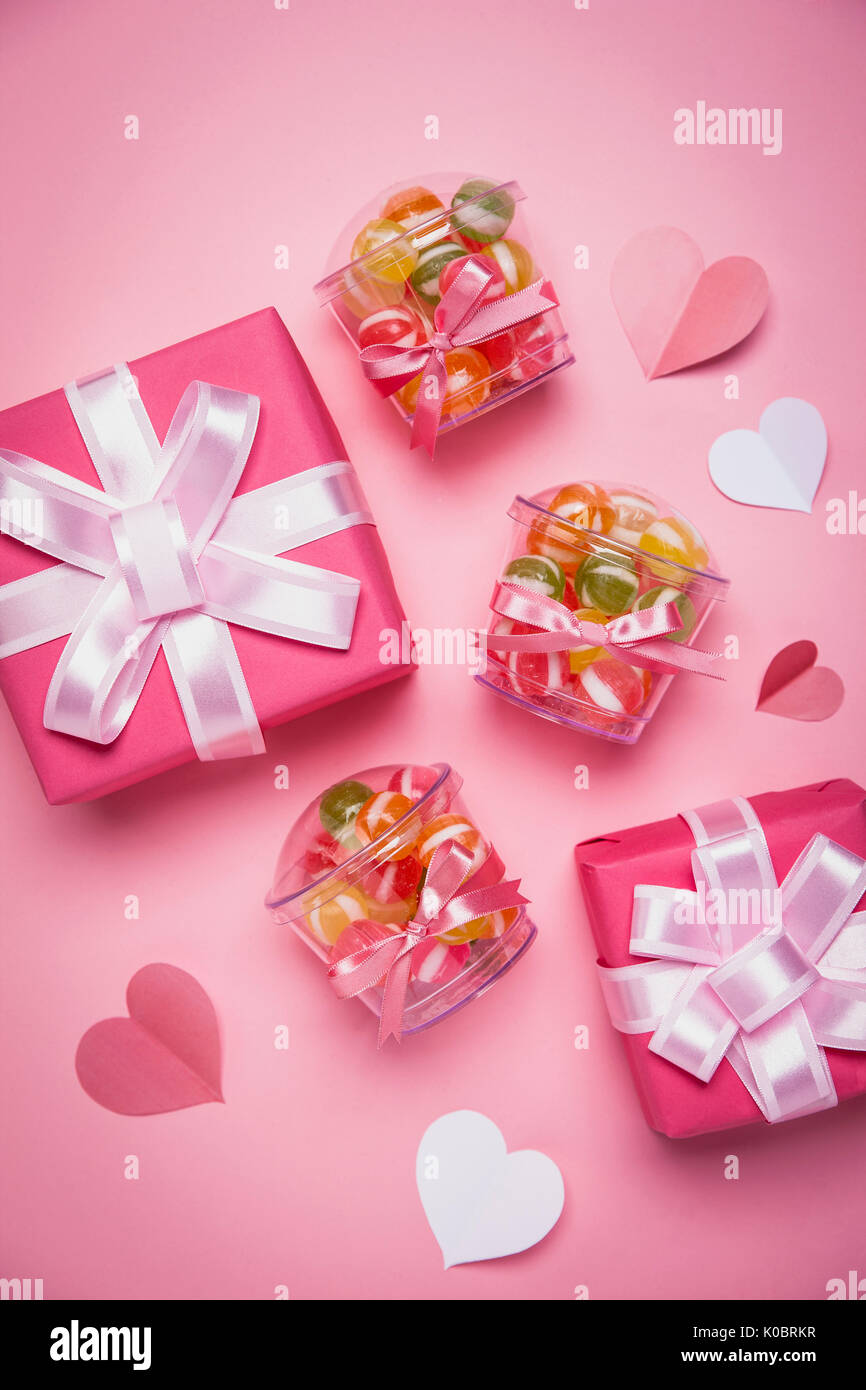 Present boxes and candies in cups with ribbons for White Day Stock ...