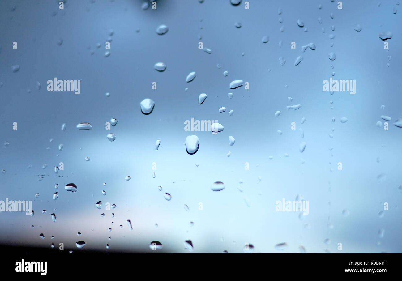 Sky behind window with rain drops hi-res stock photography and images ...