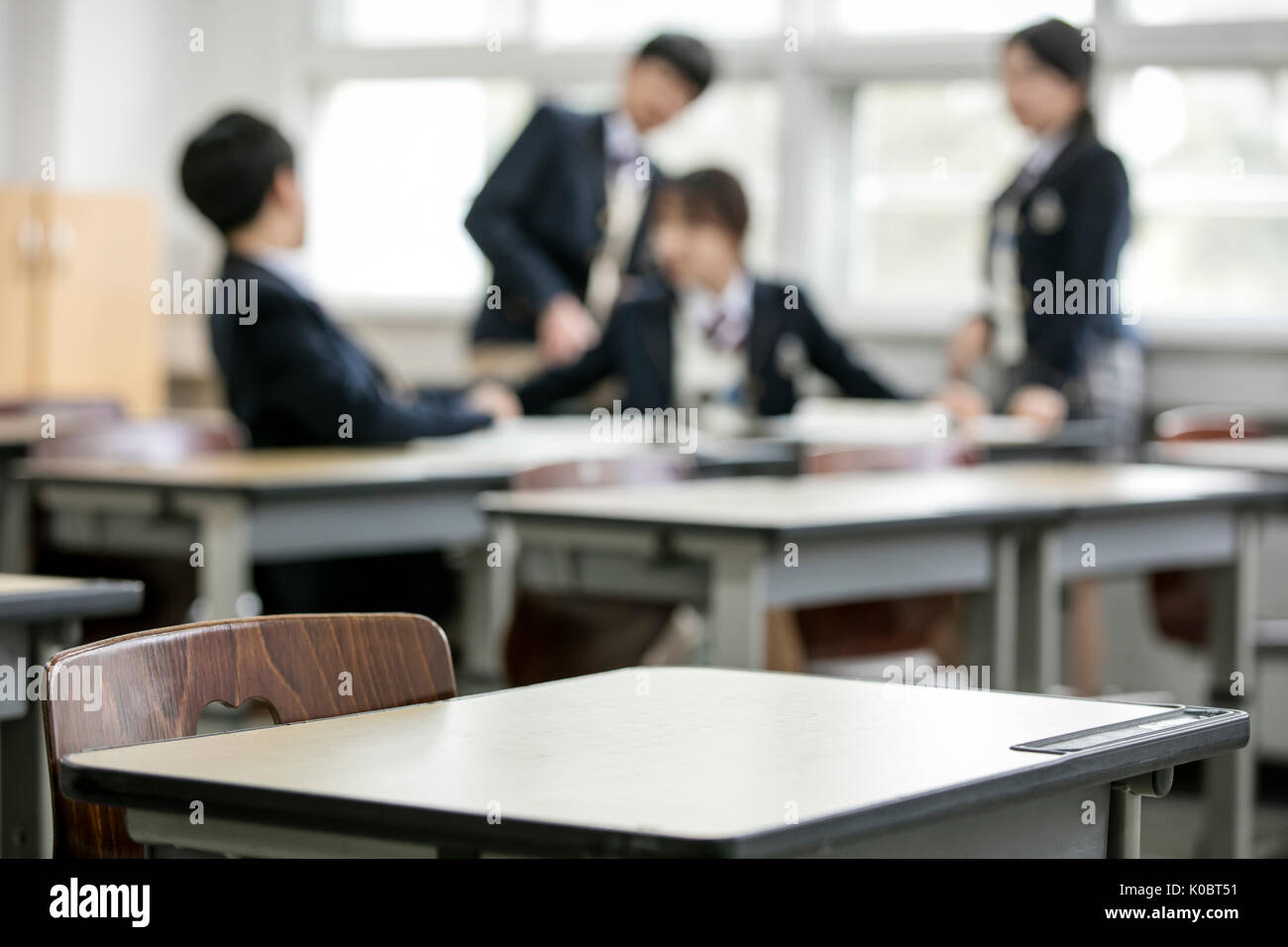 Child classroom uniform hi-res stock photography and images - Alamy