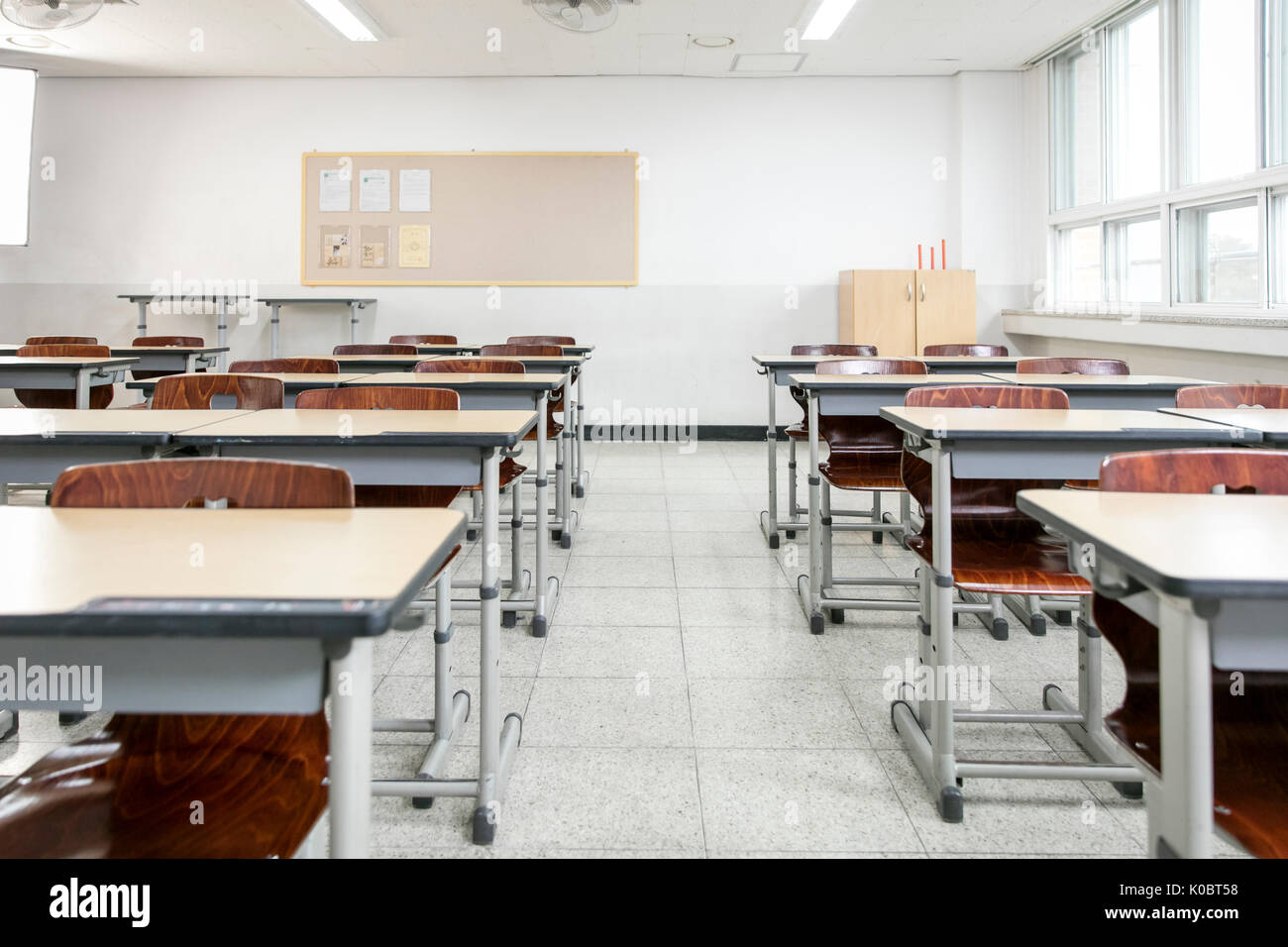 View of classroom with chairs and desks Stock Photo - Alamy