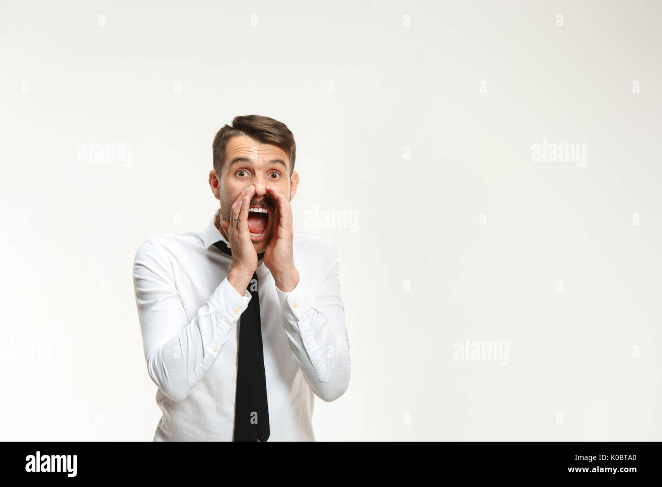 Successful business mane crying on white Stock Photo - Alamy
