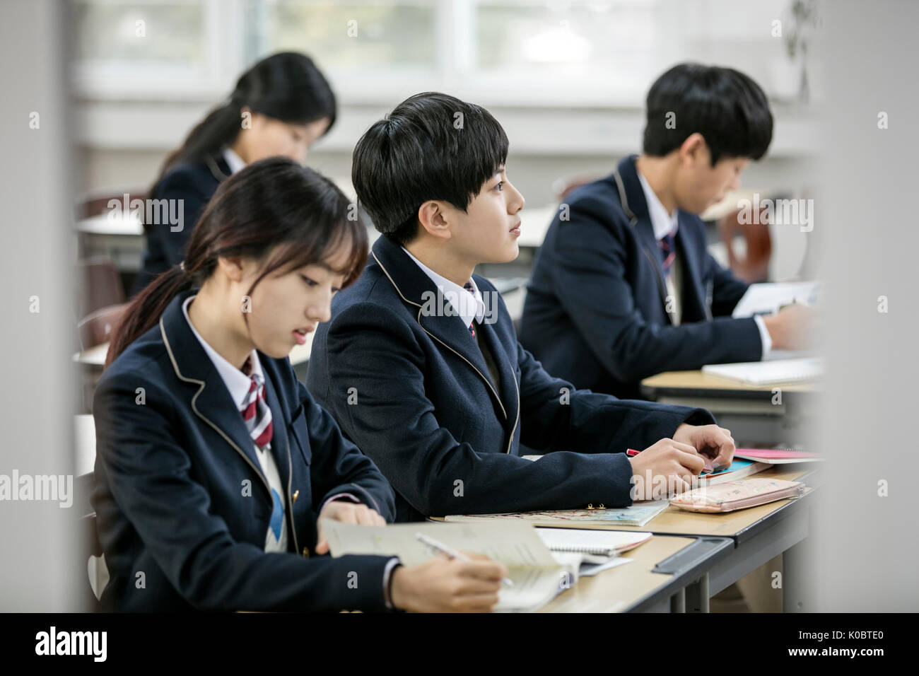 Child classroom uniform hi-res stock photography and images - Alamy