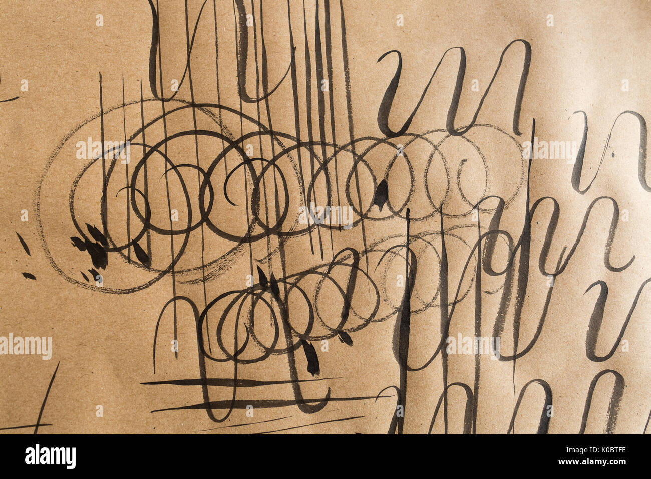 calligraphy, practice, education concept. on light brown paper for ...