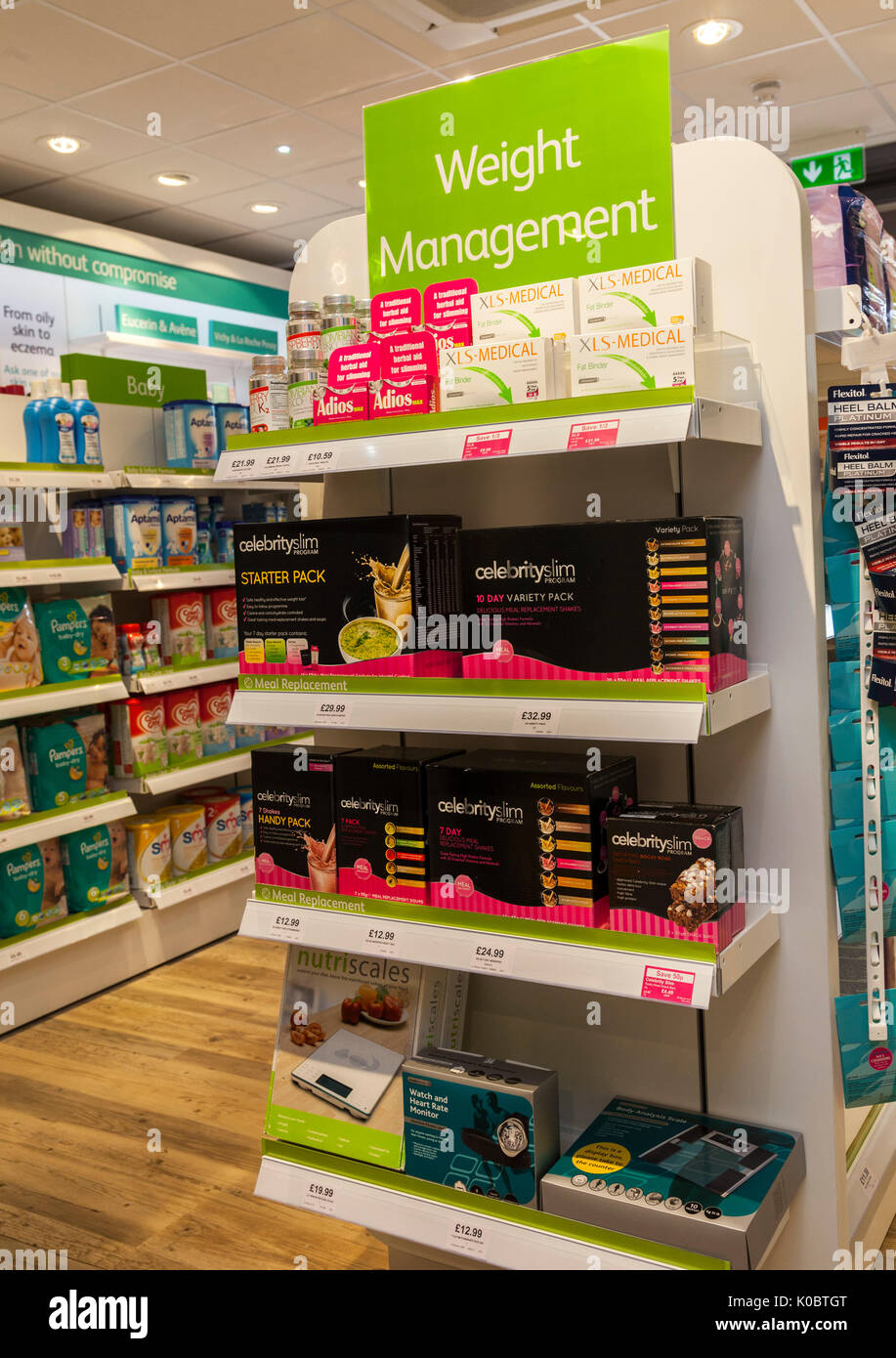 Weight management products in a chemist shop,pharmacy shelf,pharmacists ...