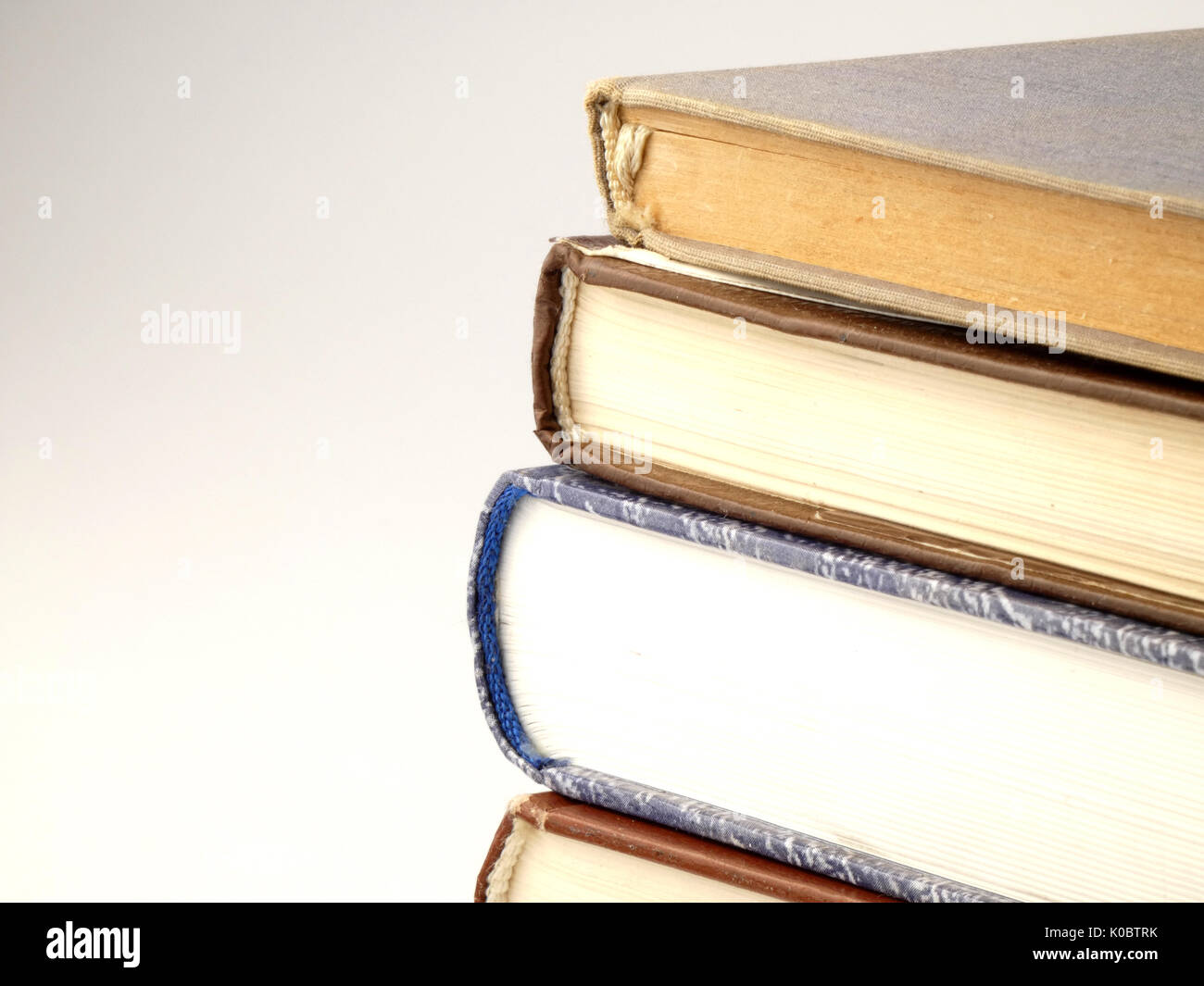 Pile of books isolated on white background Stock Photo - Alamy