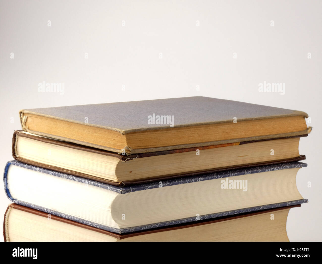 Pile of books isolated on white background Stock Photo - Alamy