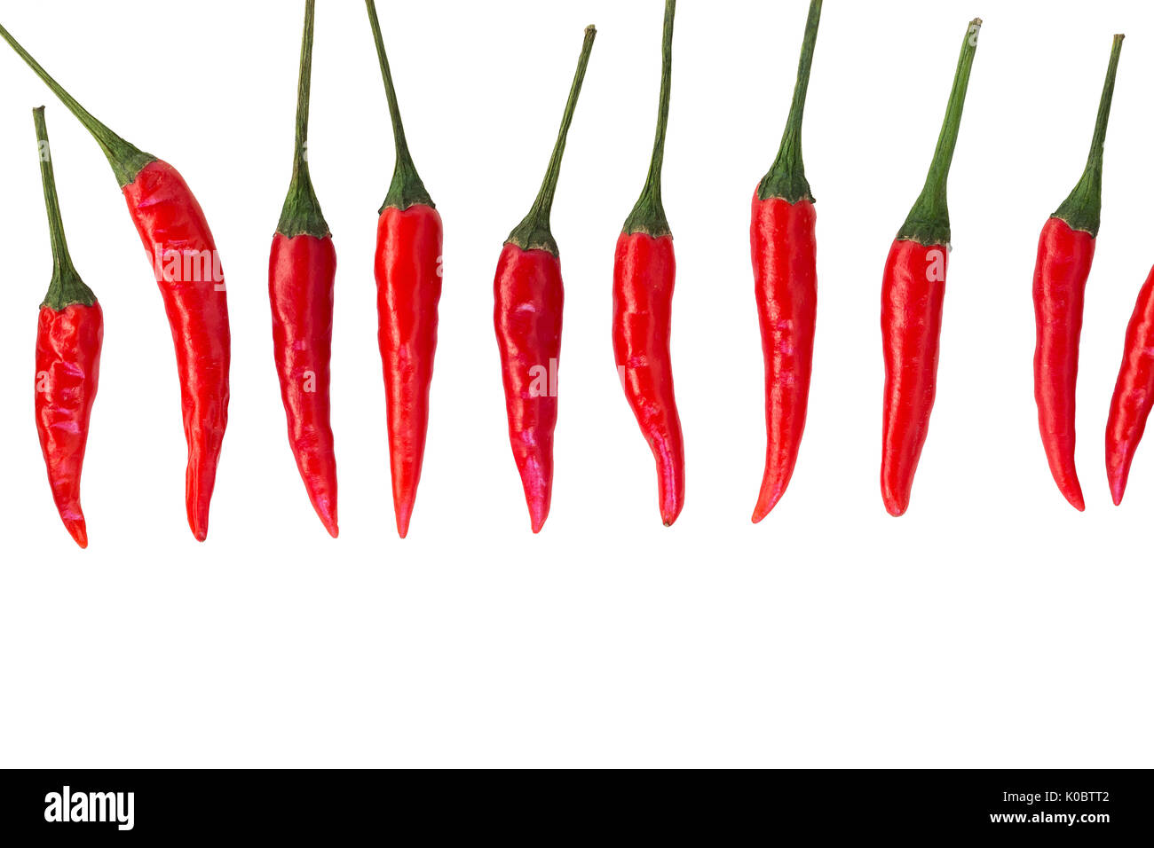 red hot chili peppers, popular spices concept - vertically stacked row ...