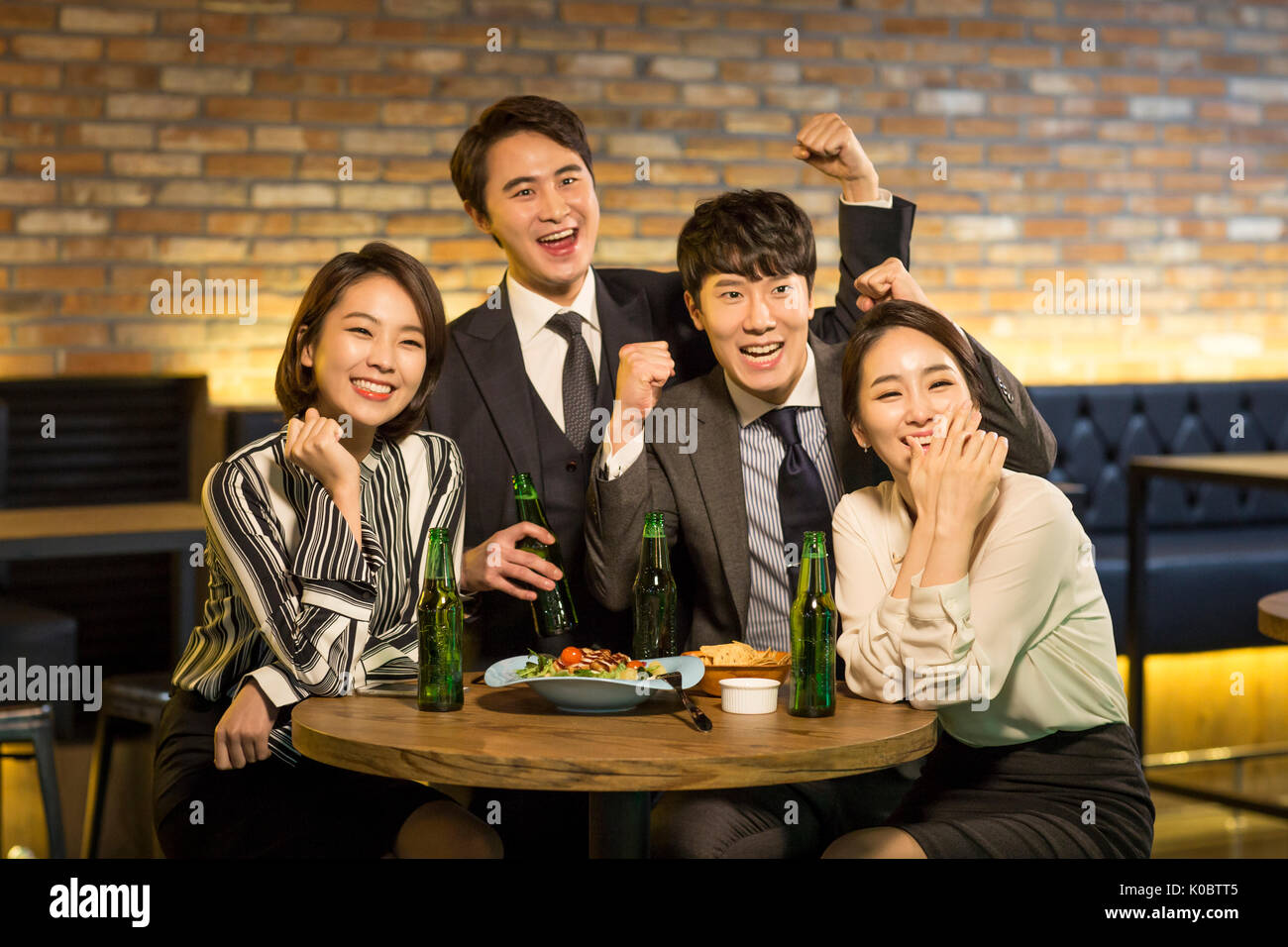 Coworkers cheering hi-res stock photography and images - Alamy