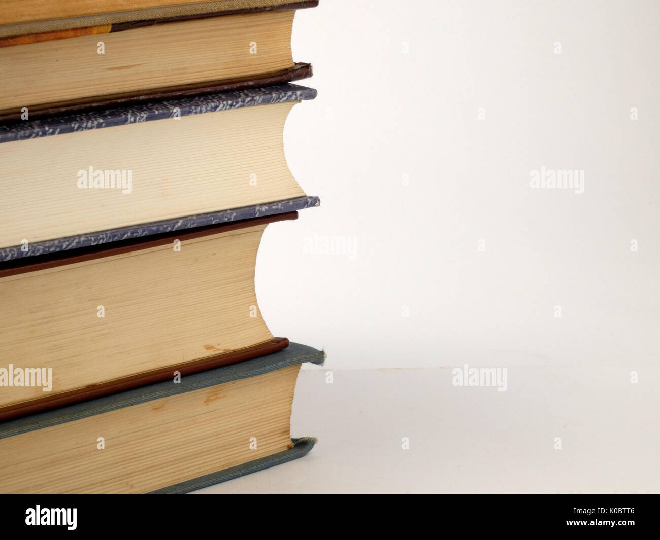 Pile of books isolated on white background Stock Photo - Alamy