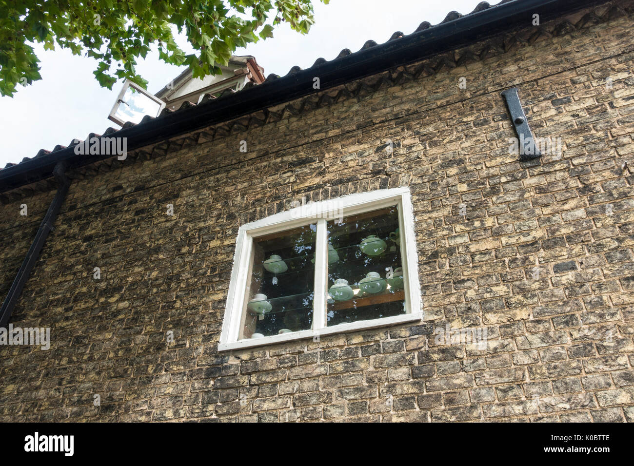 Second storey window in Waterside antiques center Ely Stock Photo - Alamy