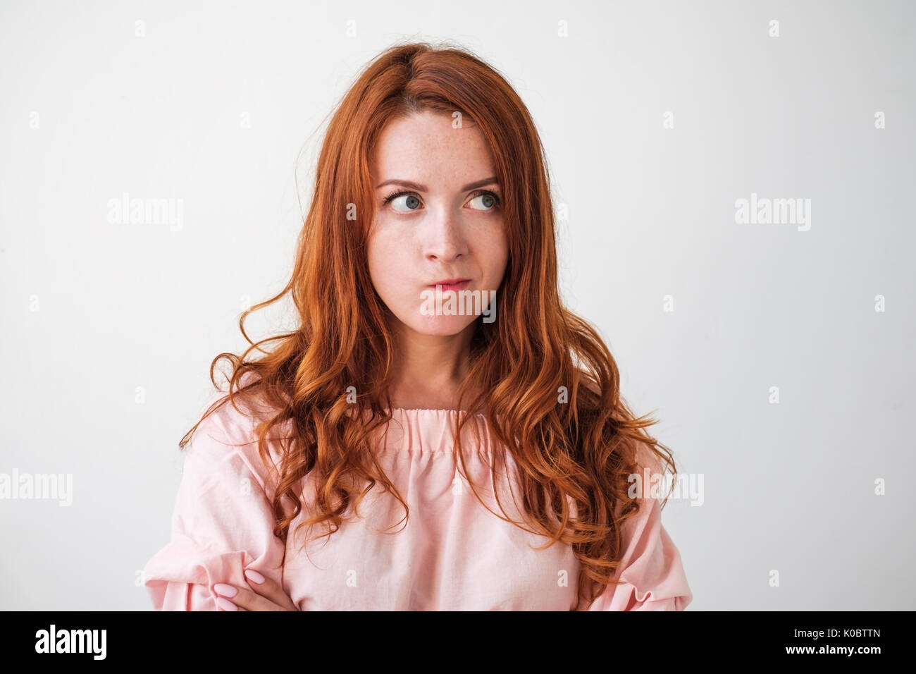 Caucasian woman model with ginger hair posing indoors Stock Photo - Alamy