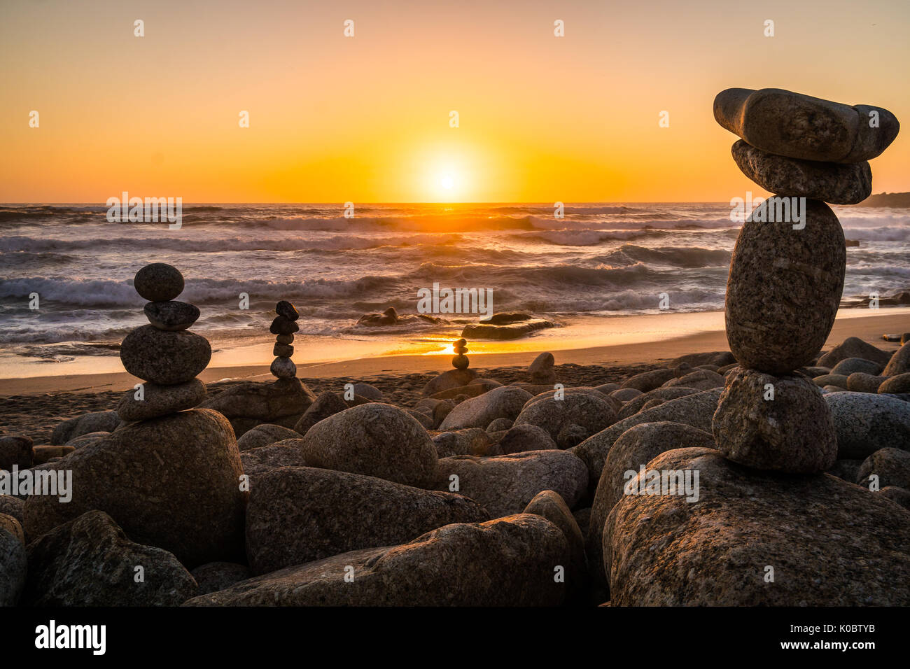 Sunset Rock Balancing Stock Photo - Alamy