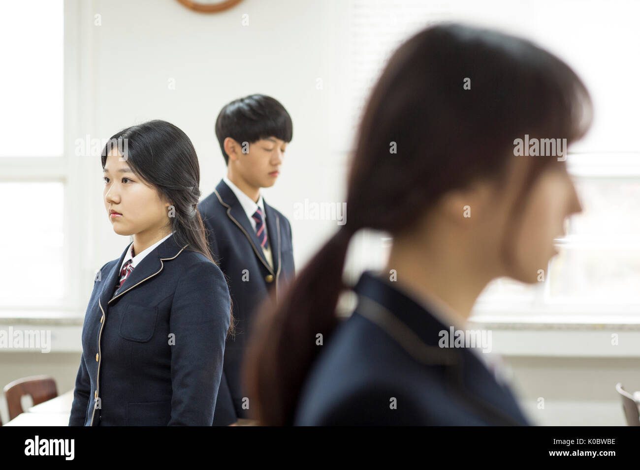 Side view of school students in cold atmosphere Stock Photo - Alamy