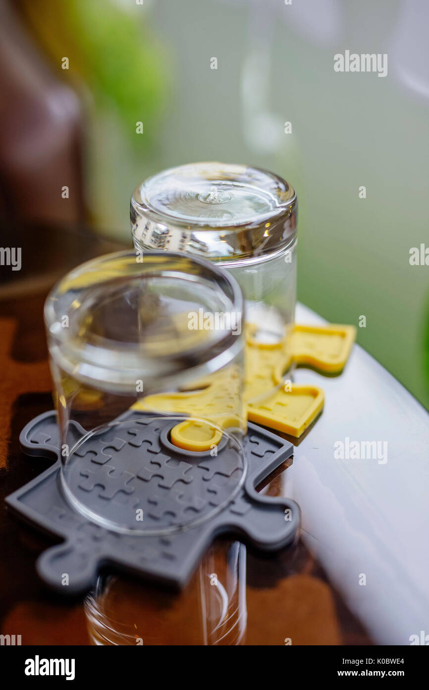 glass cup and mat Stock Photo - Alamy