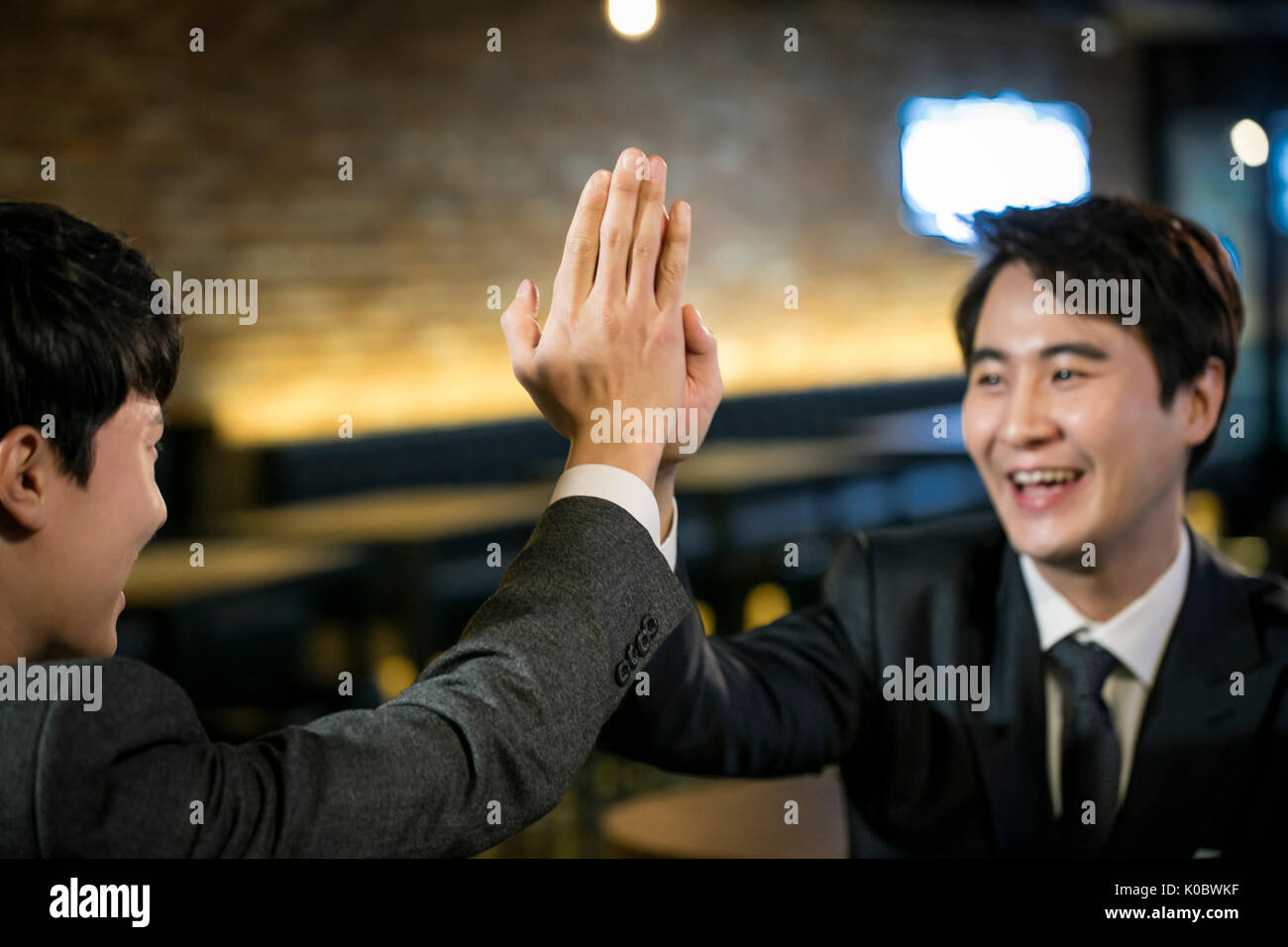 Slapping friend hi-res stock photography and images - Alamy