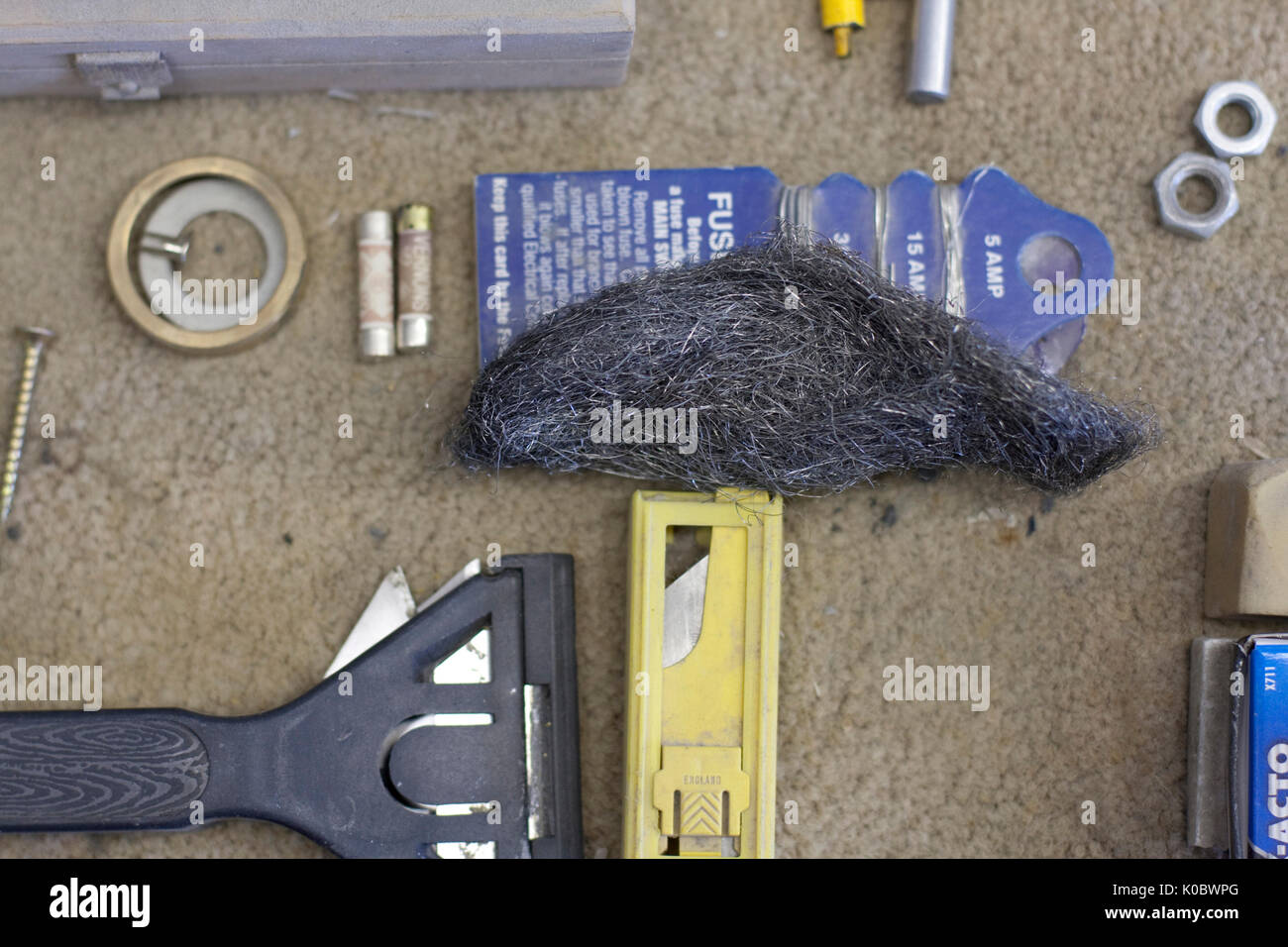 Assorted hand tools on a workbench Stock Photo - Alamy