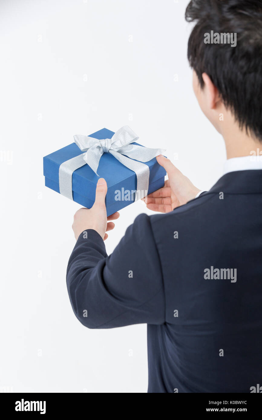 Adult male holding box rear view hi-res stock photography and images ...