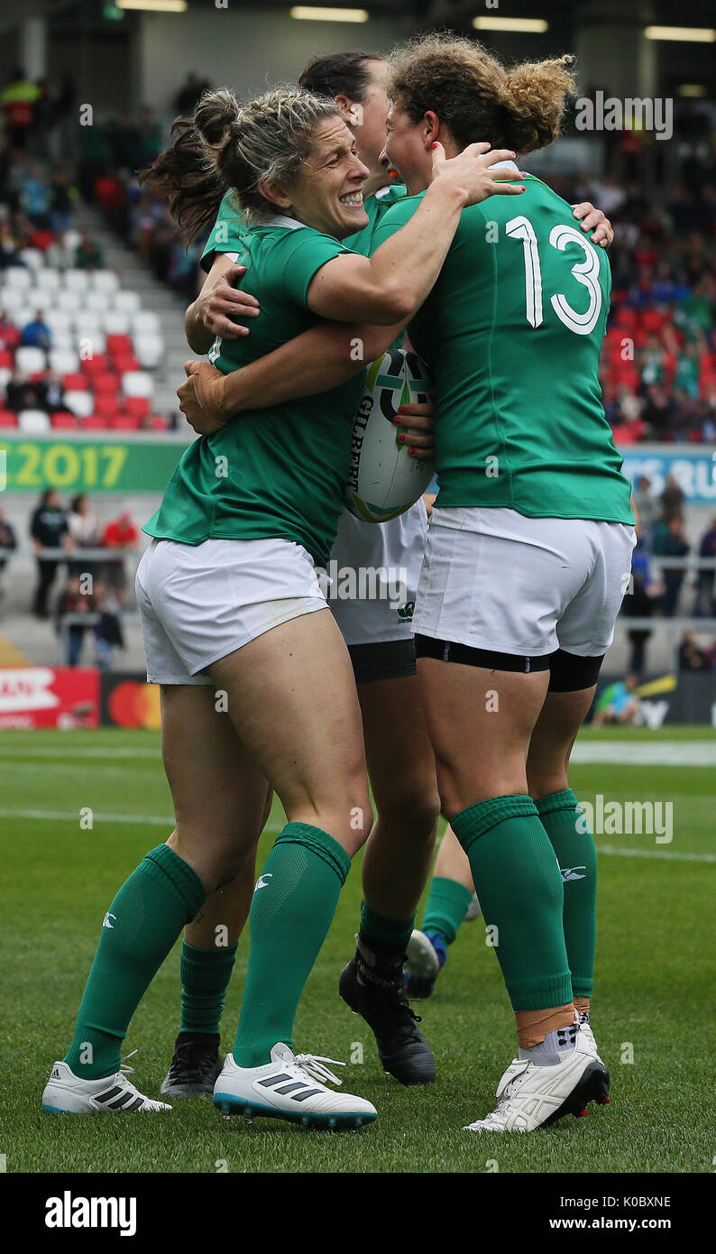 Ireland's Alison Miller (left) celebrates scoring her side's second try ...