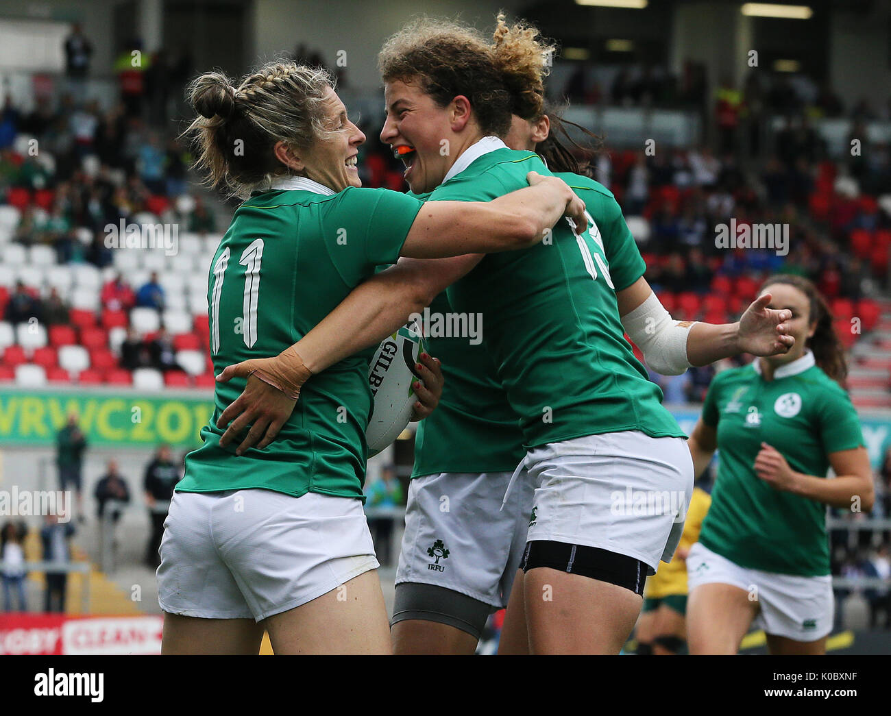 Ireland's Alison Miller (left) celebrates scoring her side's second try ...