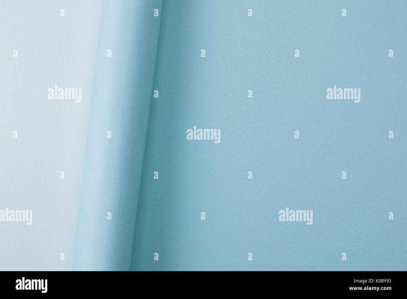 Rolled blue paper hi-res stock photography and images - Alamy