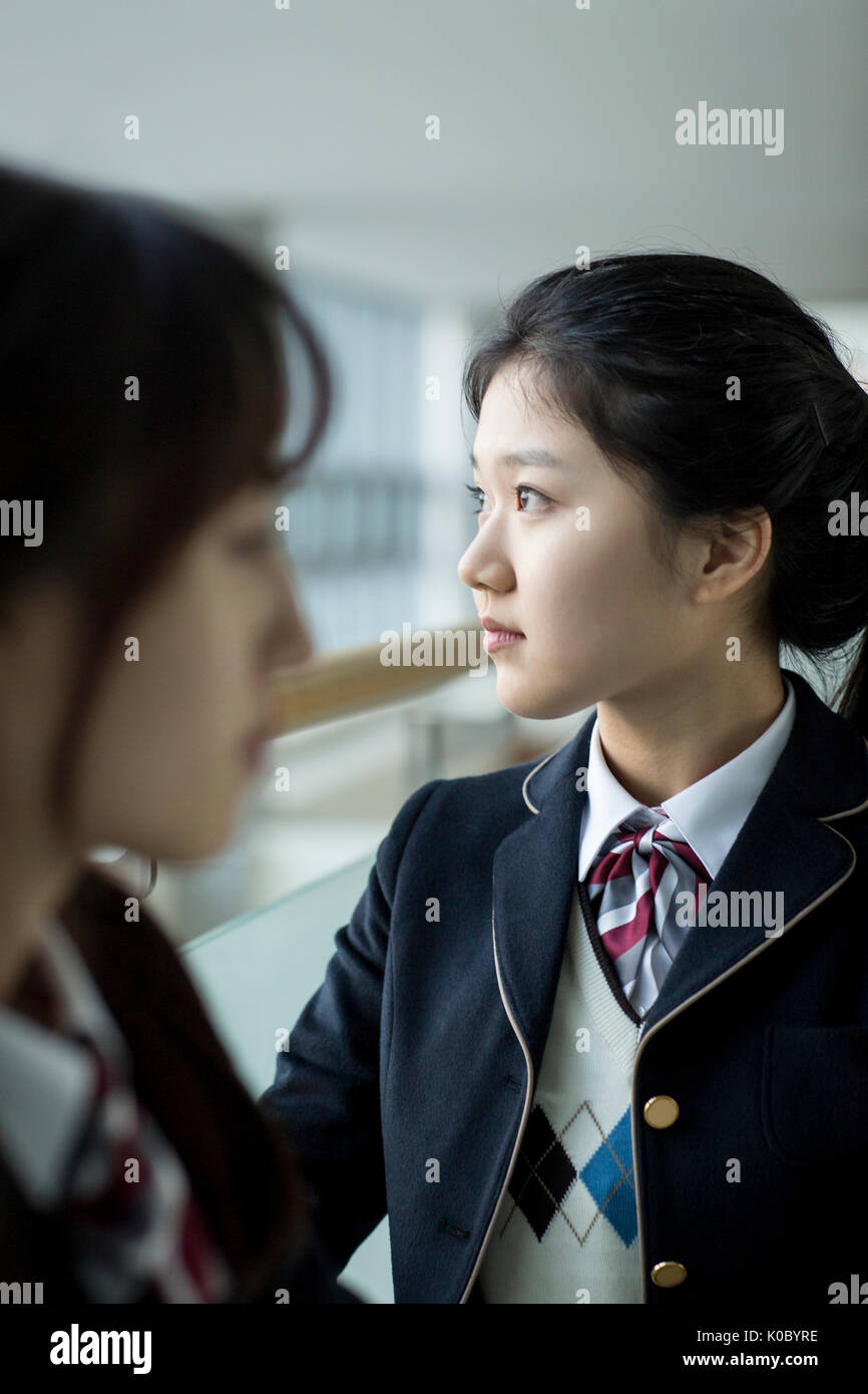 Portrait of two schools girls at school Stock Photo - Alamy