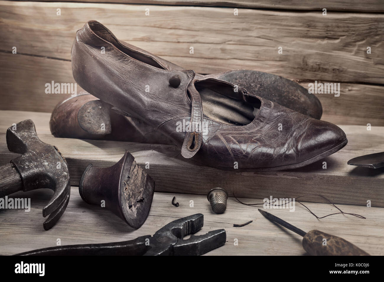 Shoes repair hi-res stock photography and images - Alamy