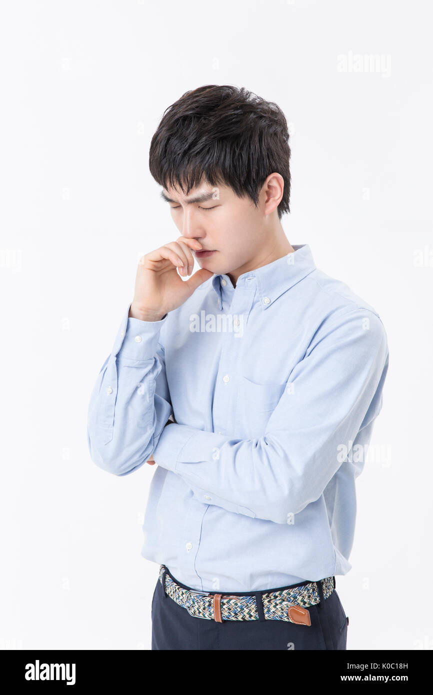 Side view of young man worried Stock Photo - Alamy