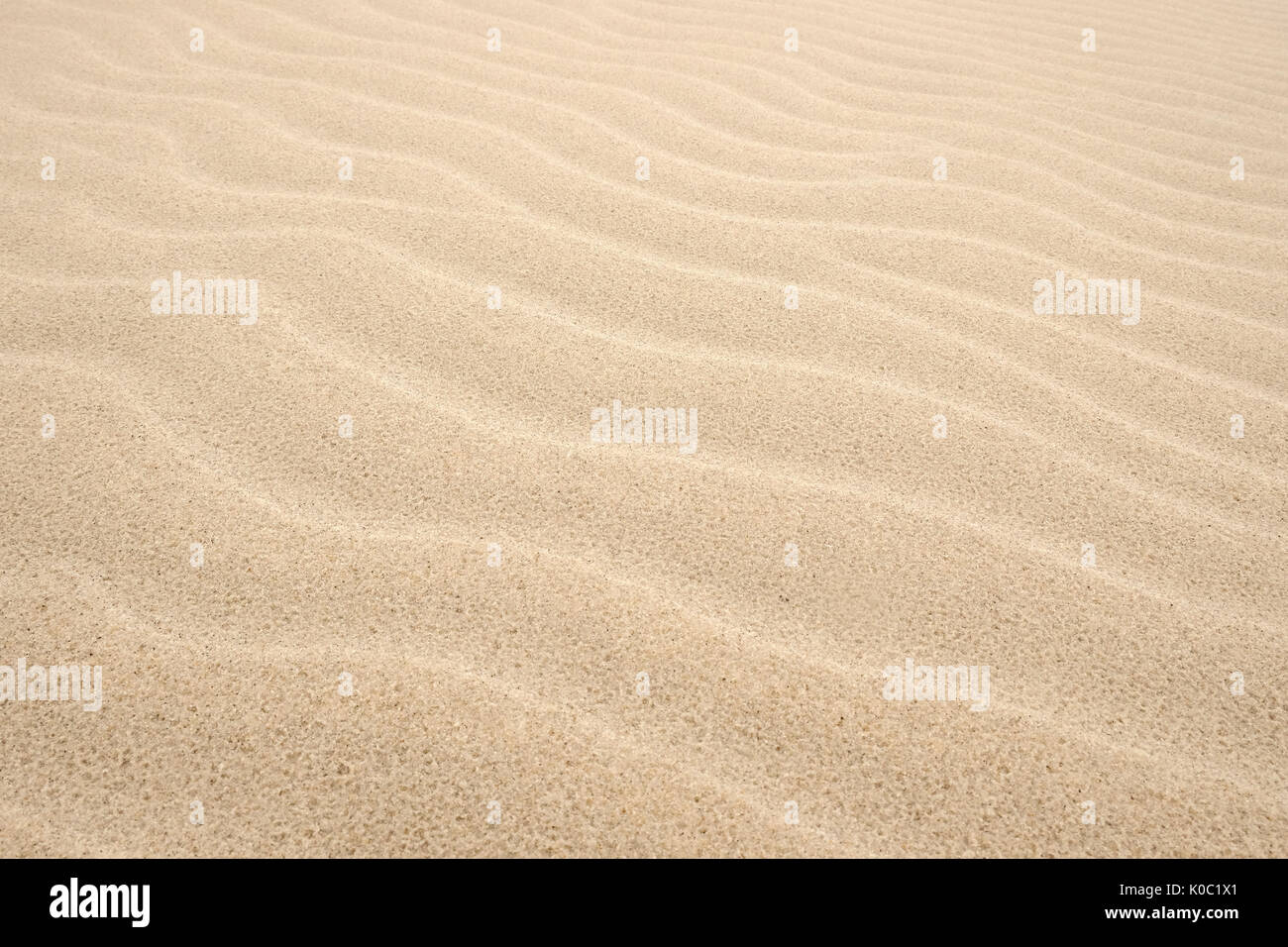 Sand beach ripple wave background pattern Stock Photo - Alamy