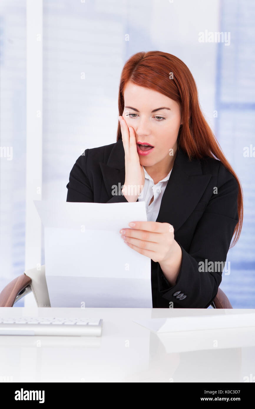 Shocked tensed redhead woman hi-res stock photography and images - Alamy