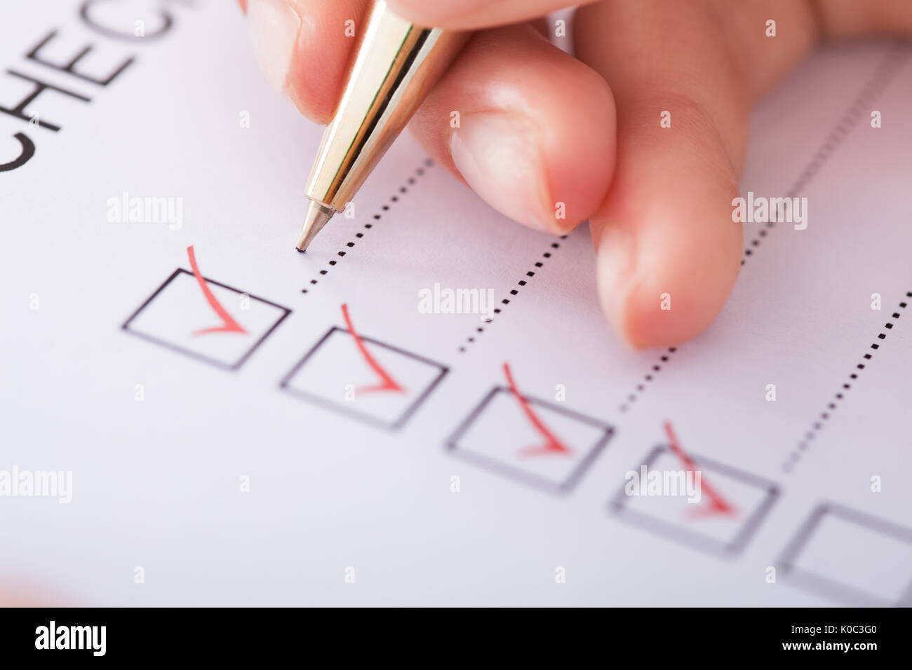 Businesswoman writing on sheet hi-res stock photography and images - Alamy