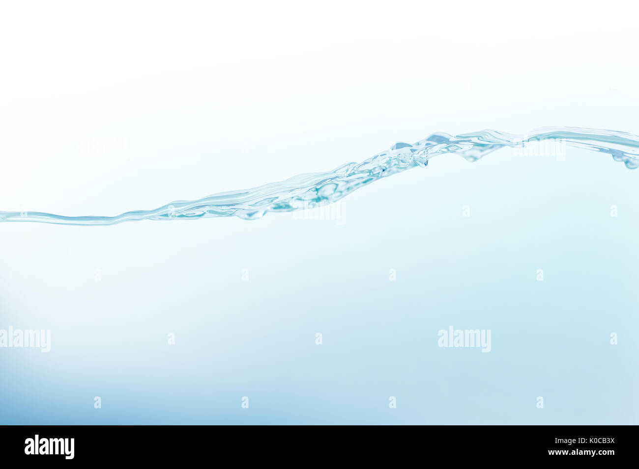 Perfect wave of clear blue water Stock Photo - Alamy