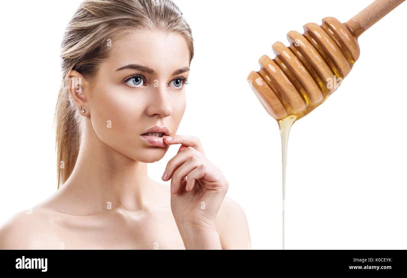 Young woman prepare for honey facial mask Stock Photo - Alamy