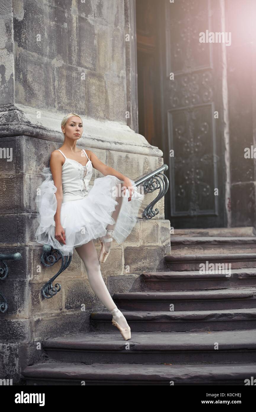 Beautiful ballerina dancing near an old building Stock Photo - Alamy