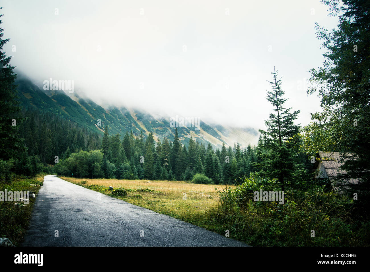 A beautiful mountain landscape with a road Stock Photo - Alamy
