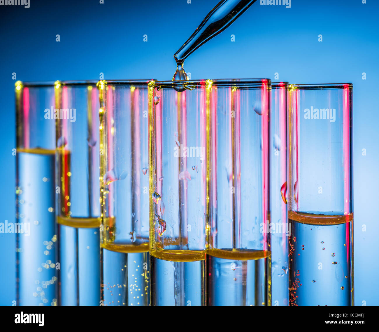 Different laboratory beakers and glassware. Multicolored Stock Photo ...