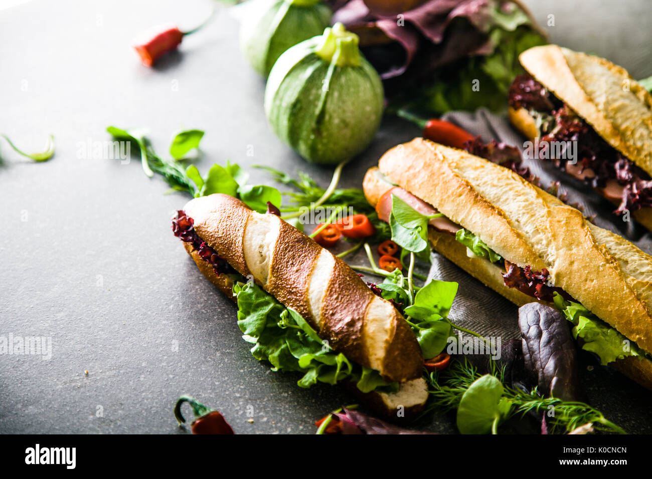 Sandwich. Fast food. Deli sandwich with vegetables Stock Photo - Alamy