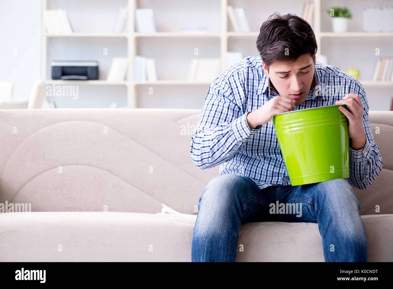 Man suffering from sick stomach and vomiting Stock Photo - Alamy
