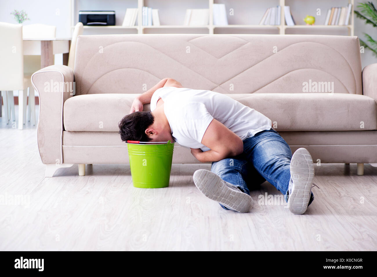 Man suffering from sick stomach and vomiting Stock Photo - Alamy