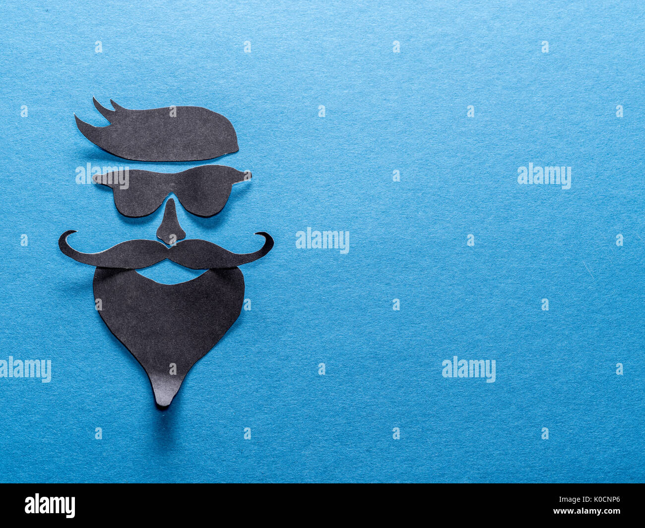 Hipster's definicial facial look cut from paper Stock Photo - Alamy