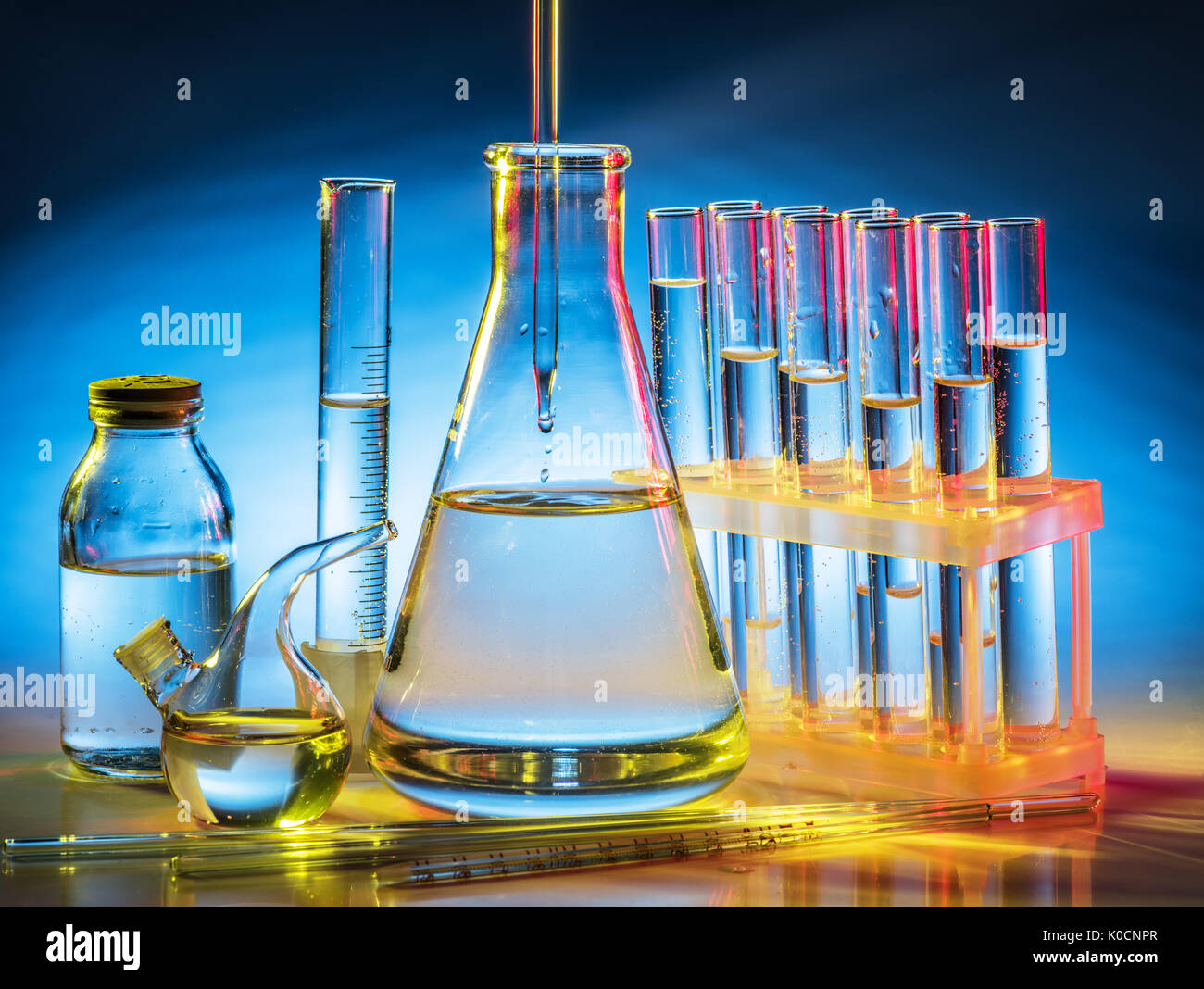 Different laboratory beakers and glassware. Multicolored Stock Photo ...