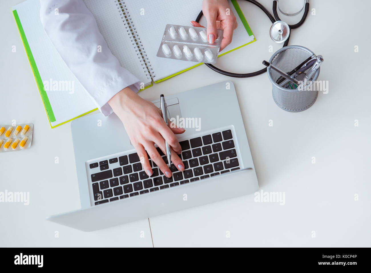 Hand writing medical prescription in computer Stock Photo - Alamy