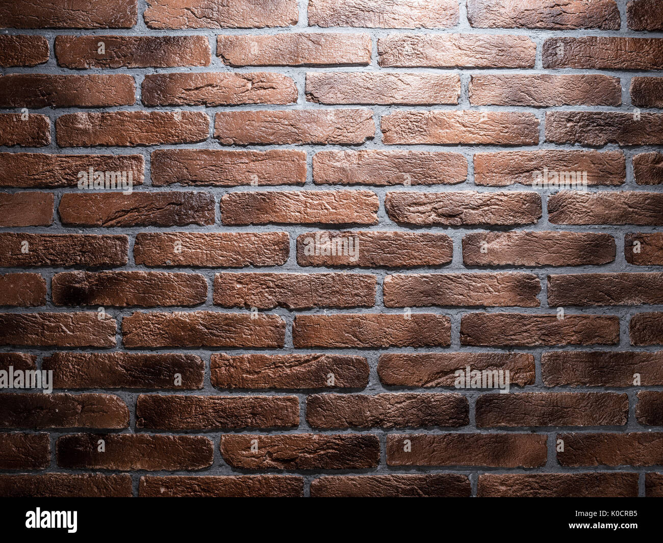 Dark brown brick wall. Close-up picture of bricks Stock Photo - Alamy