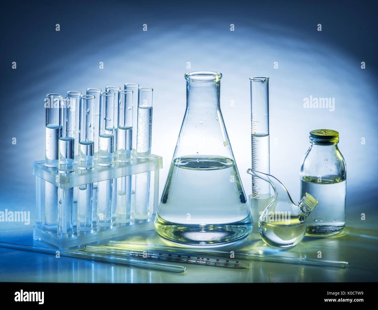 Different laboratory beakers and glassware. Multicolored Stock Photo ...